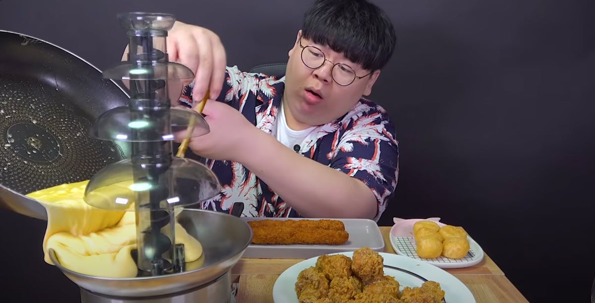 YouTuber Gets Spectacularly Attacked by Flying Cheese Fondue and Goes ...